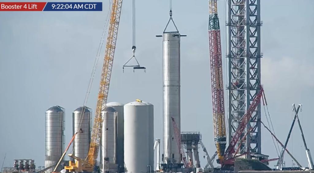 SpaceX Booster 4 Lifting Onto Launch Table | NextBigFuture.com