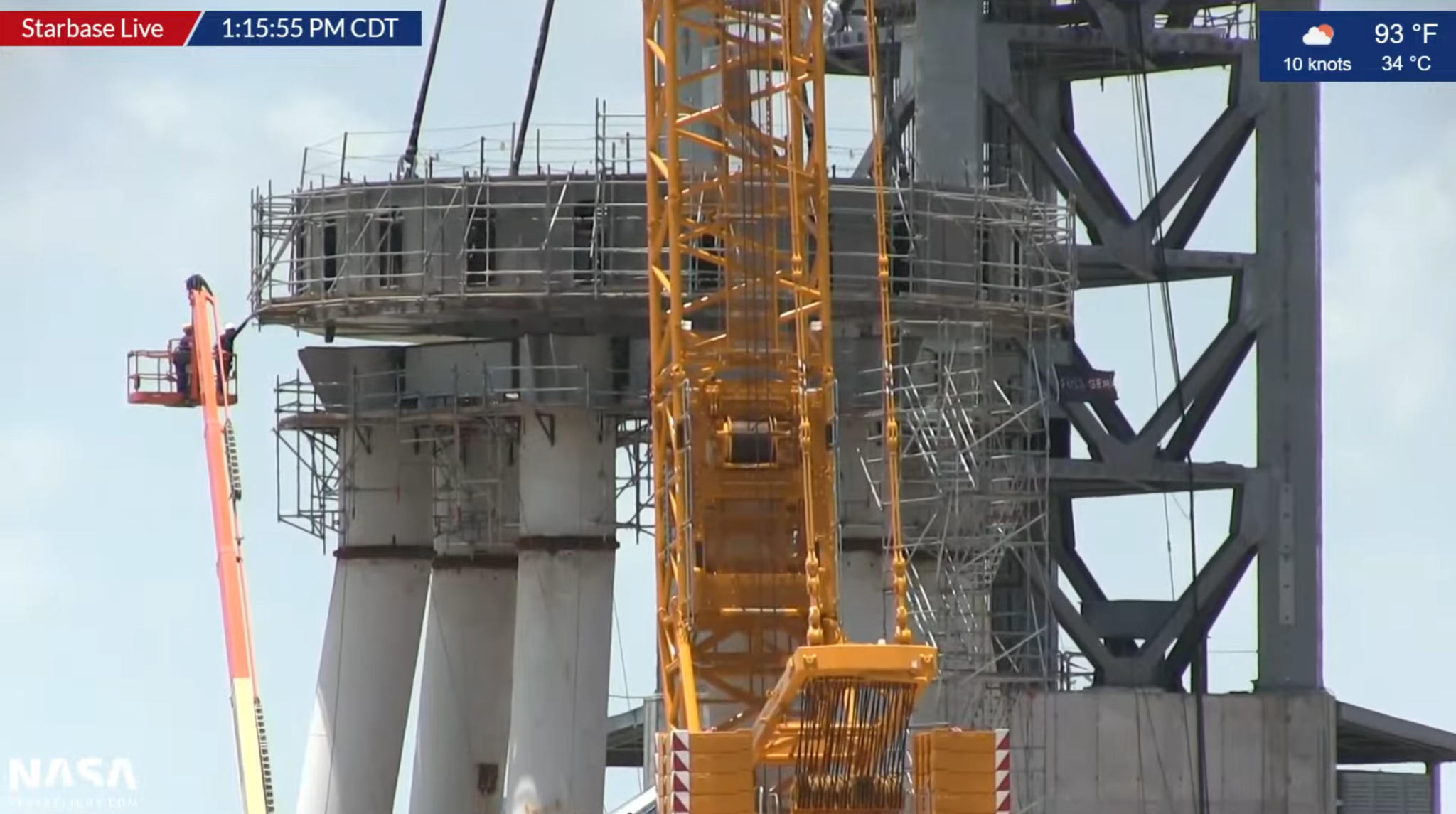 SpaceX Booster 4 Lifting Onto Launch Table | NextBigFuture.com