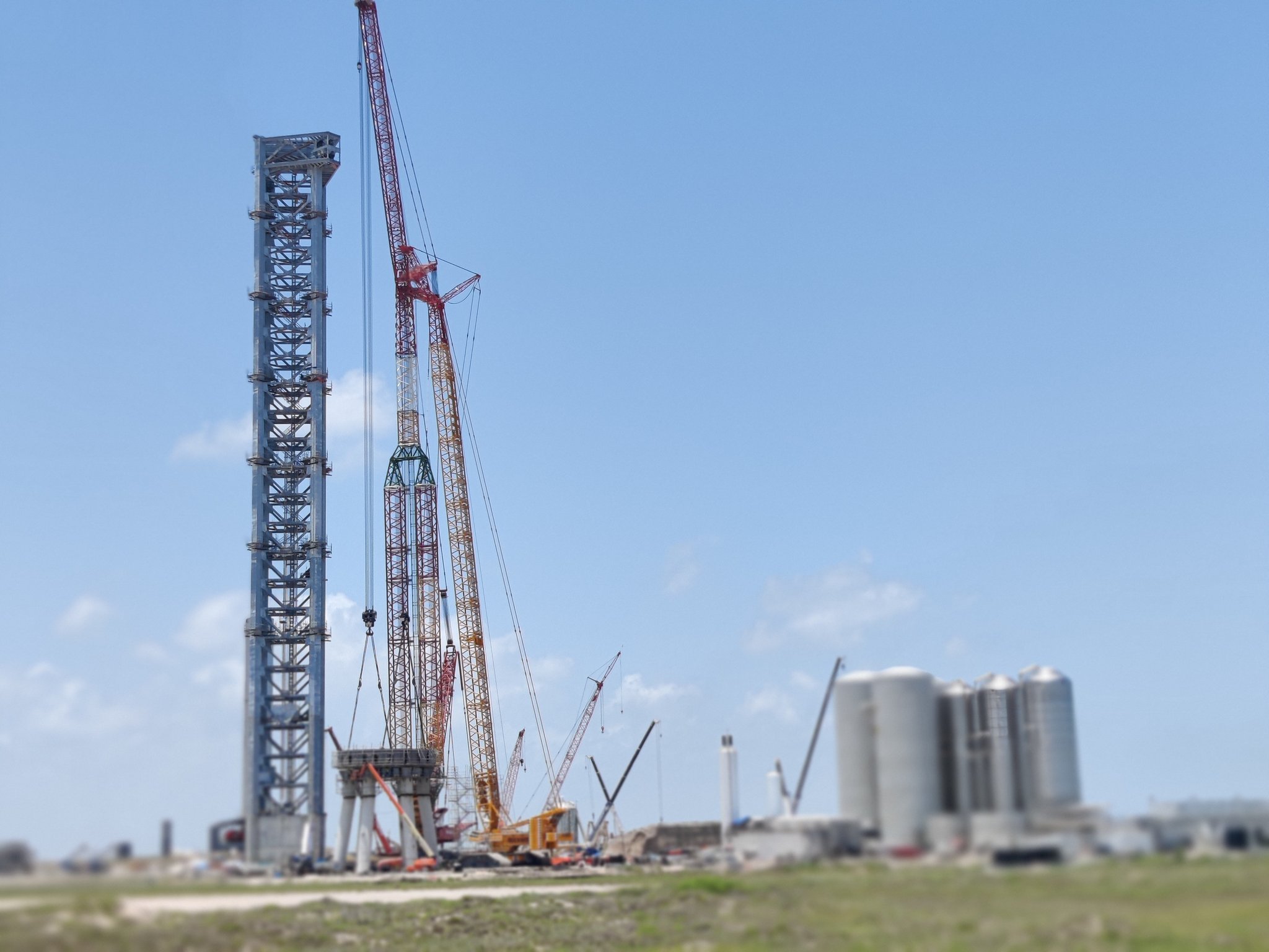 SpaceX Booster 4 Lifting Onto Launch Table | NextBigFuture.com